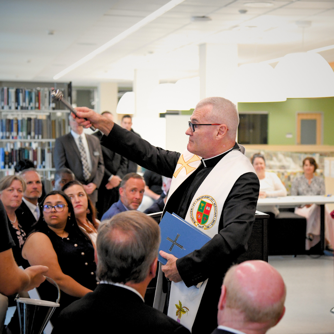 Fr. George Smith Blesses New Student Center - Basilian Fathers